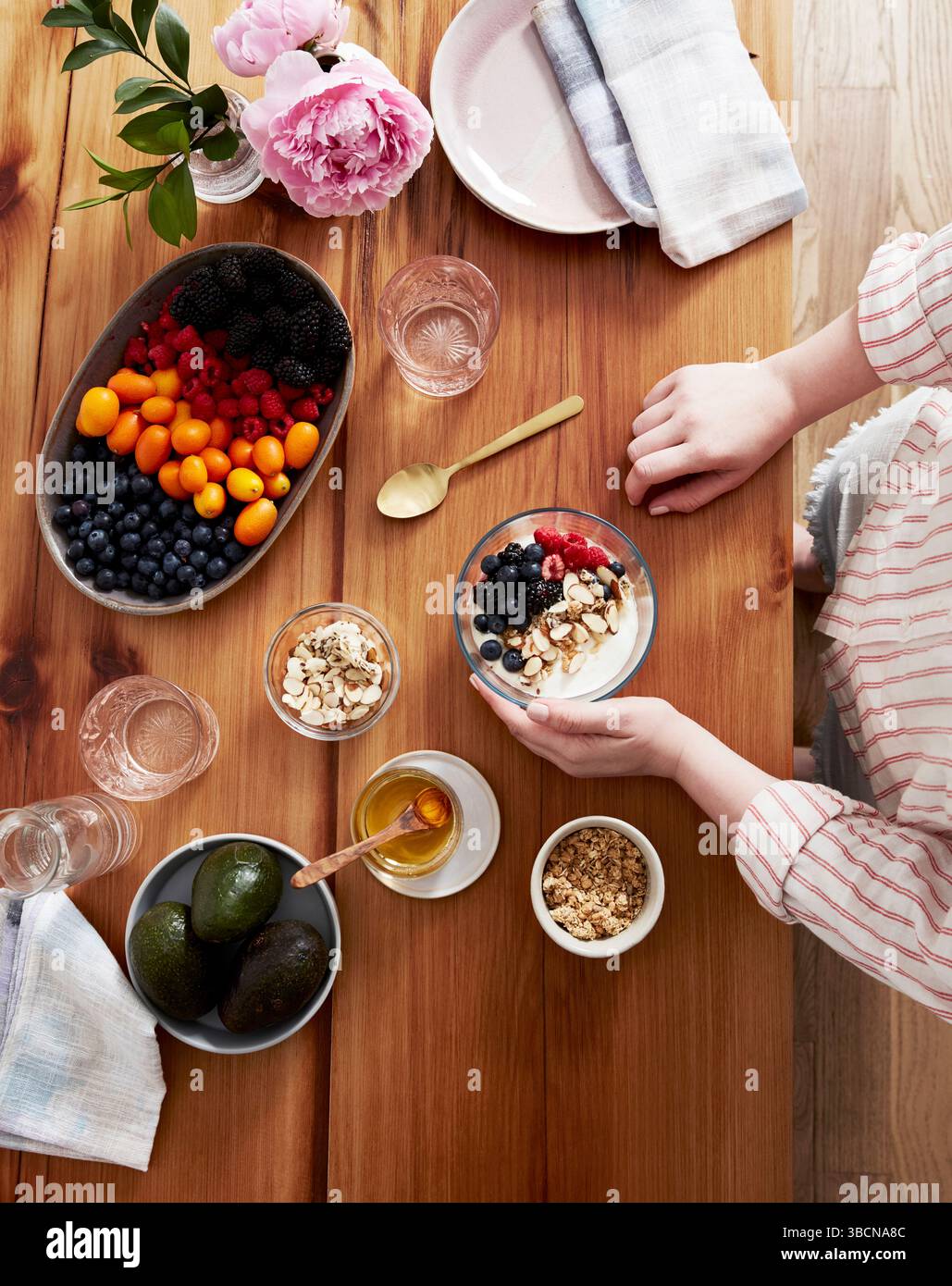Healthy breakfast setup with yogurt, fruit, granola, and honey Stock ...