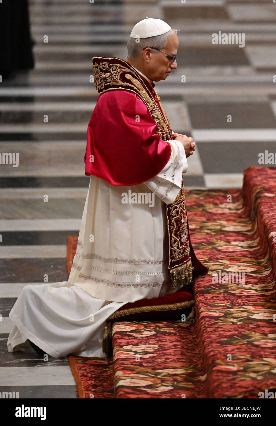 Rome, Italy. 20th May, 2025. Pope Leo XIV prays in front of Saint Paul's tomb during his visit ...