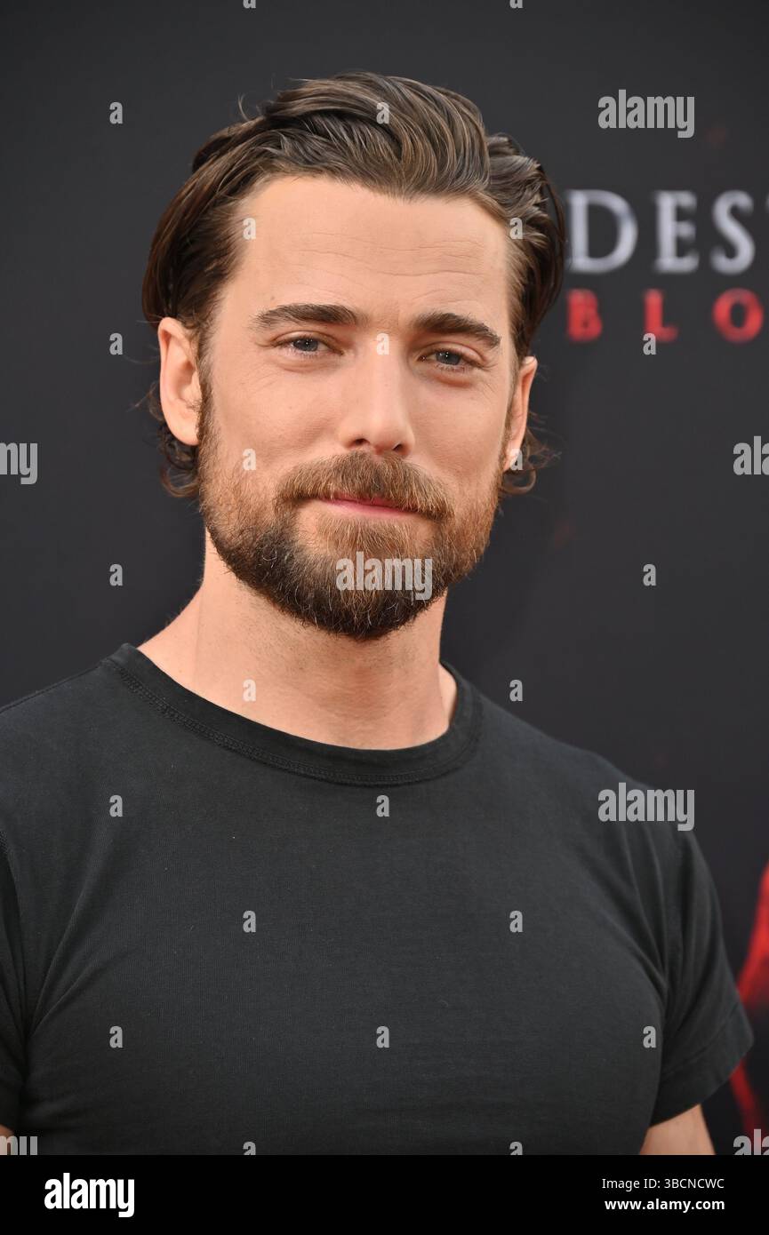 Hollywood, CA USA - May 12, 2025: Dustin Milligan attends the premiere ...