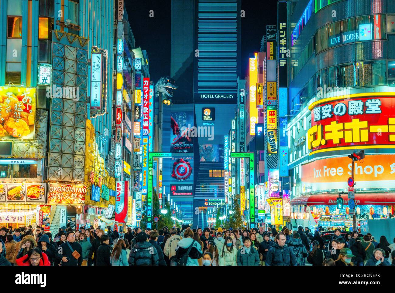 High-resolution photo capturing the bustling nightlife of Shinjuku, Tokyo, Japan. The image ...