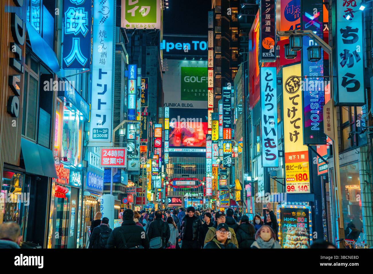 High-resolution photo capturing the bustling nightlife of Shinjuku, Tokyo, Japan. The image ...