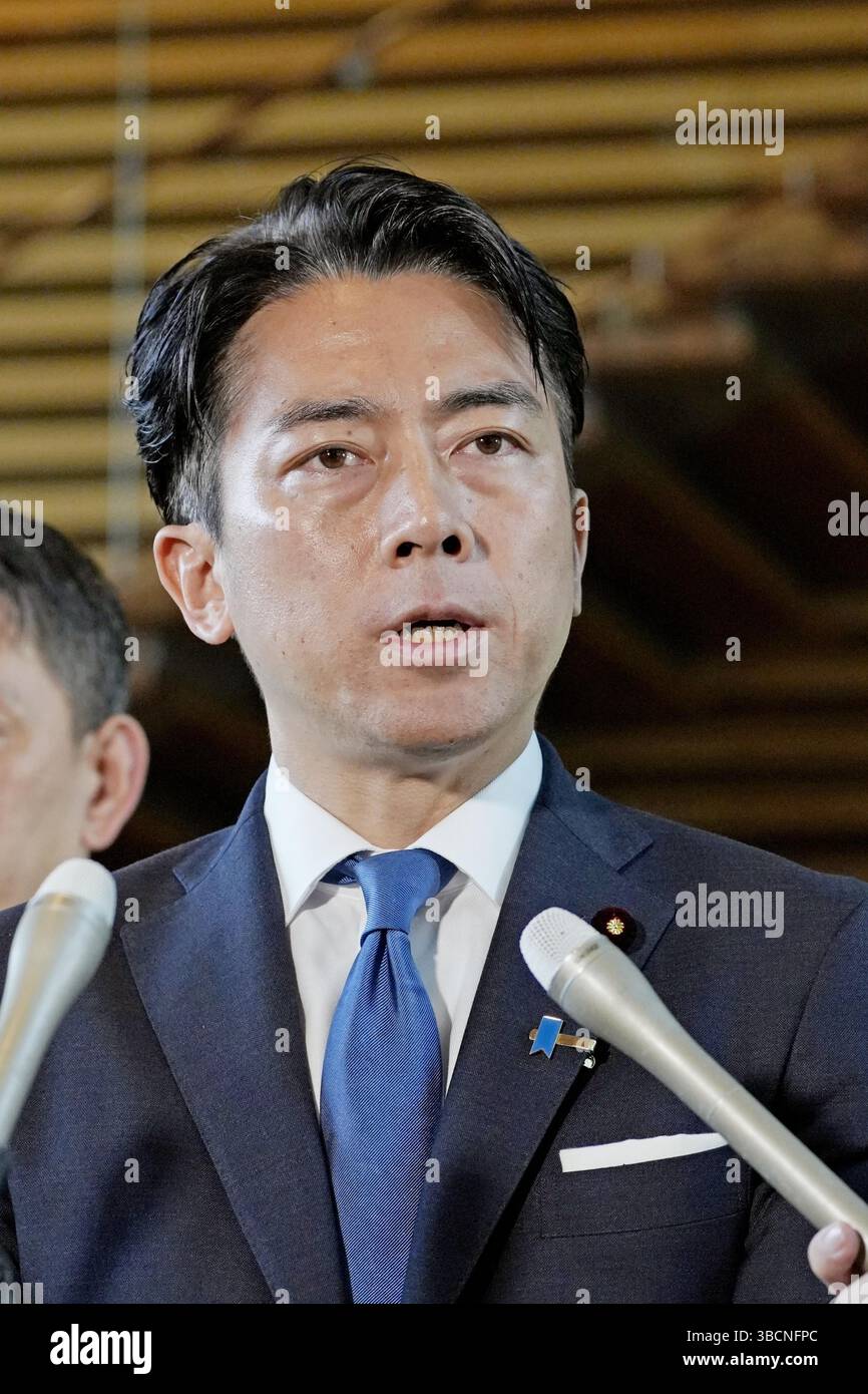 Shinjiro Koizumi speaks to reporters at the prime minister's office in ...