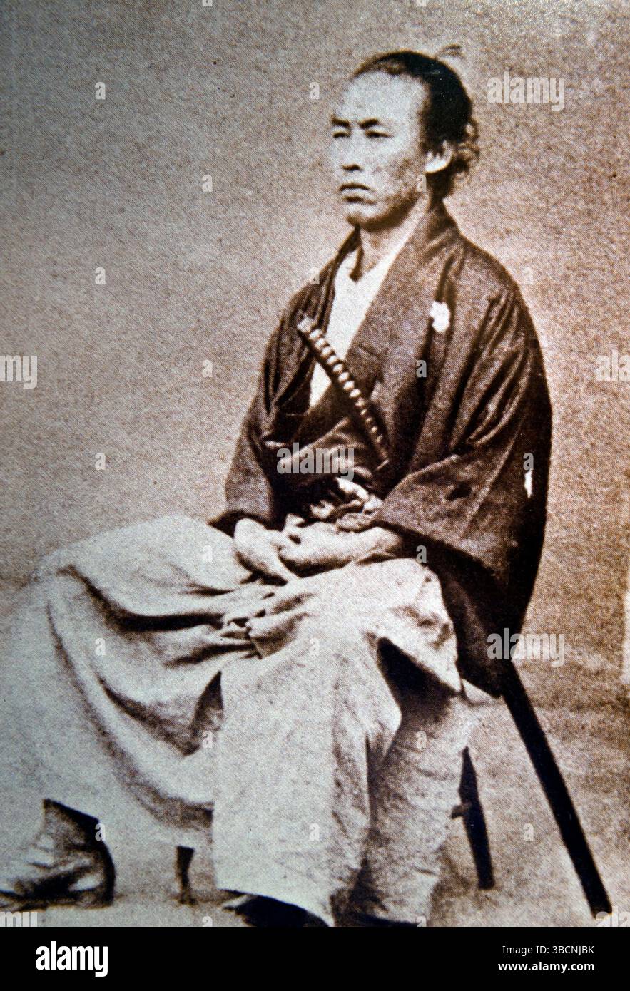 Old black & white photo of Sakamoto Ryoma posing in a studio, one of a ...