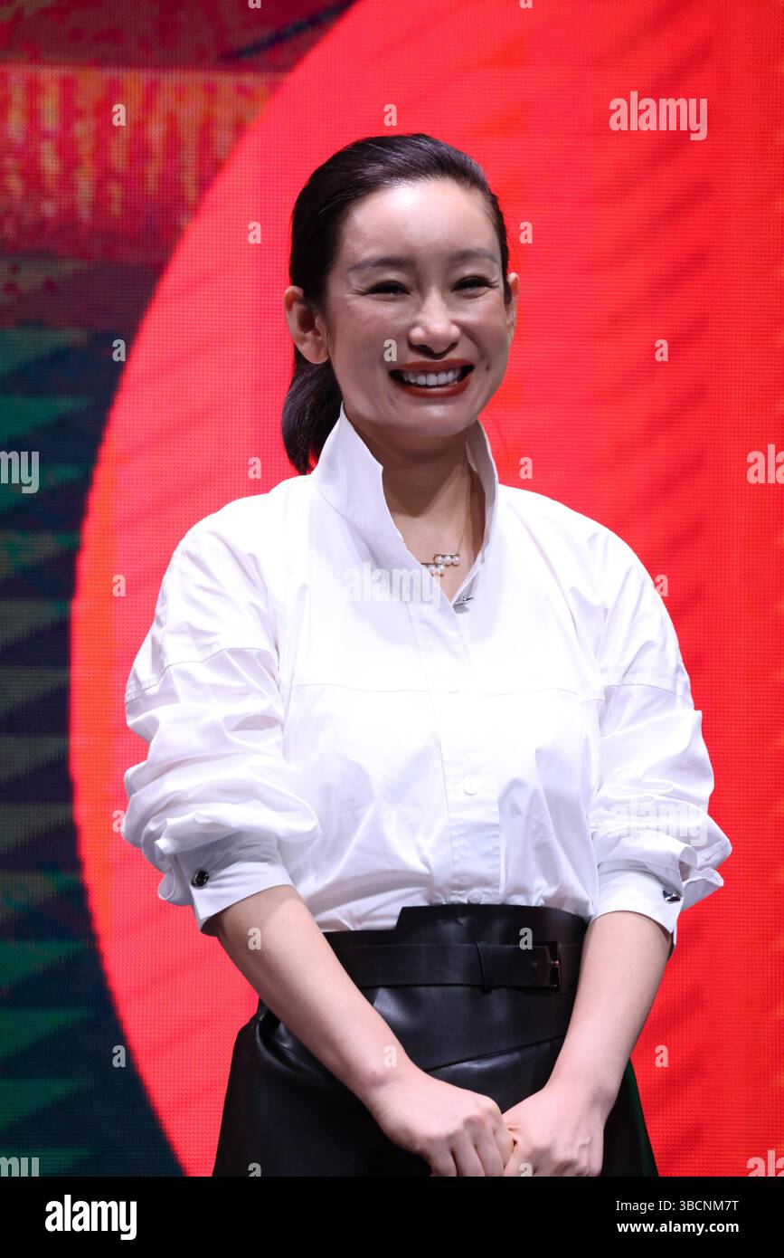 Chinese actress, screenwriter and singer Qin Hailu attends an activity ...