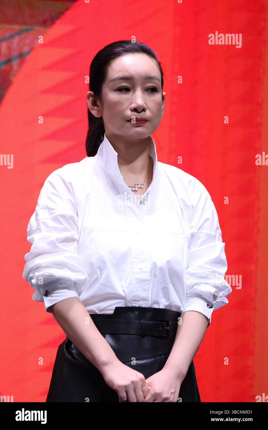 Chinese actress, screenwriter and singer Qin Hailu attends an activity ...