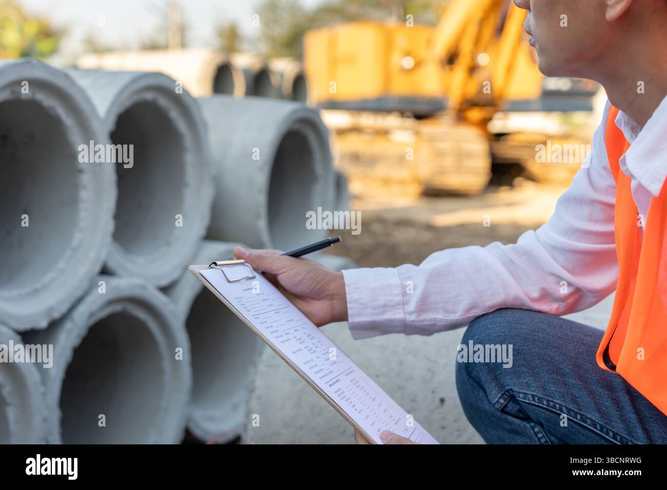 inspector or engineer is inspecting construction house using a ...