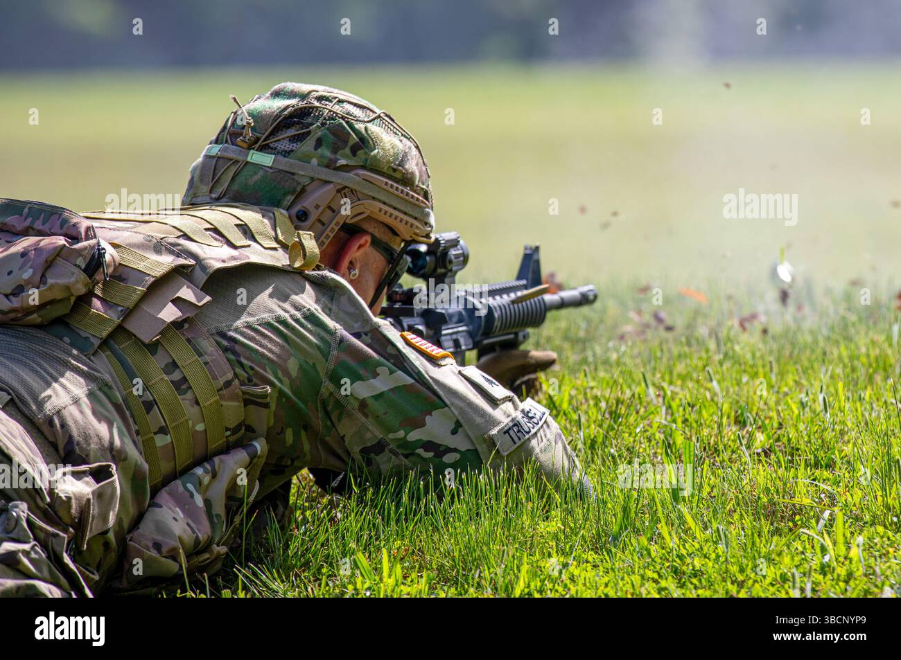 A Soldier assigned to the Tennessee Army National Guard fires an M4 ...