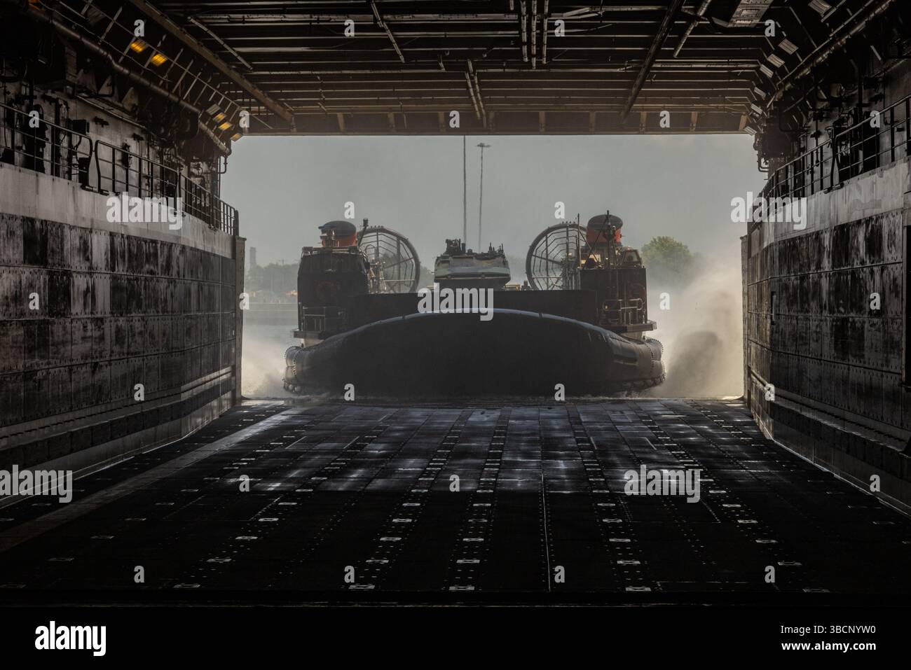 A U.S. Navy Landing Craft Air Cushion (LCAC) 2 transports a U.S. Marine ...