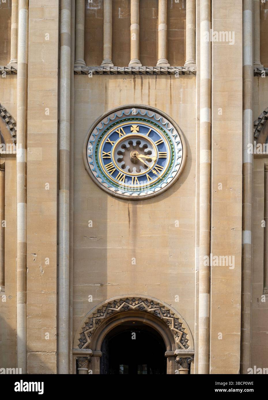 Clock on the facade of Norwich Cathedral Stock Photo - Alamy