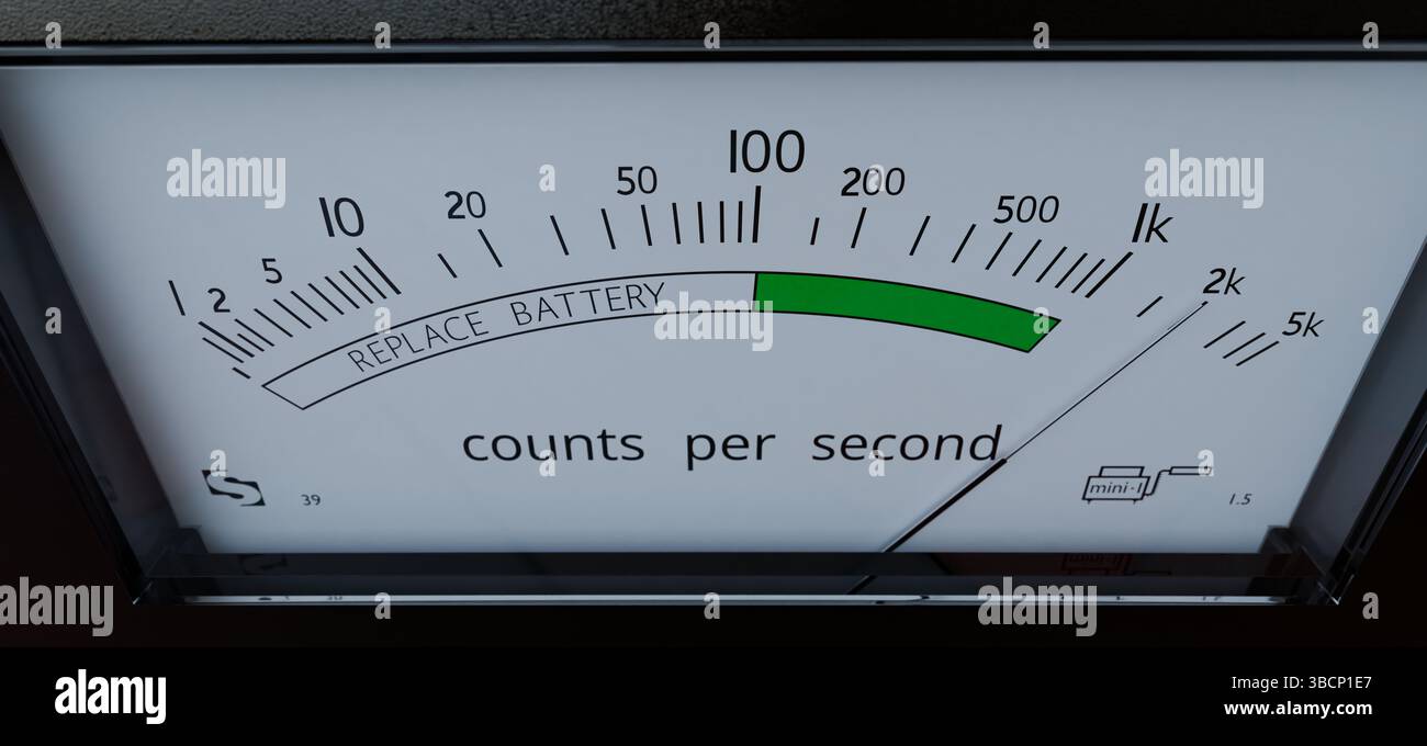 Geiger counter analogue meter closeup. Meter is showing almost 2000 cps ...