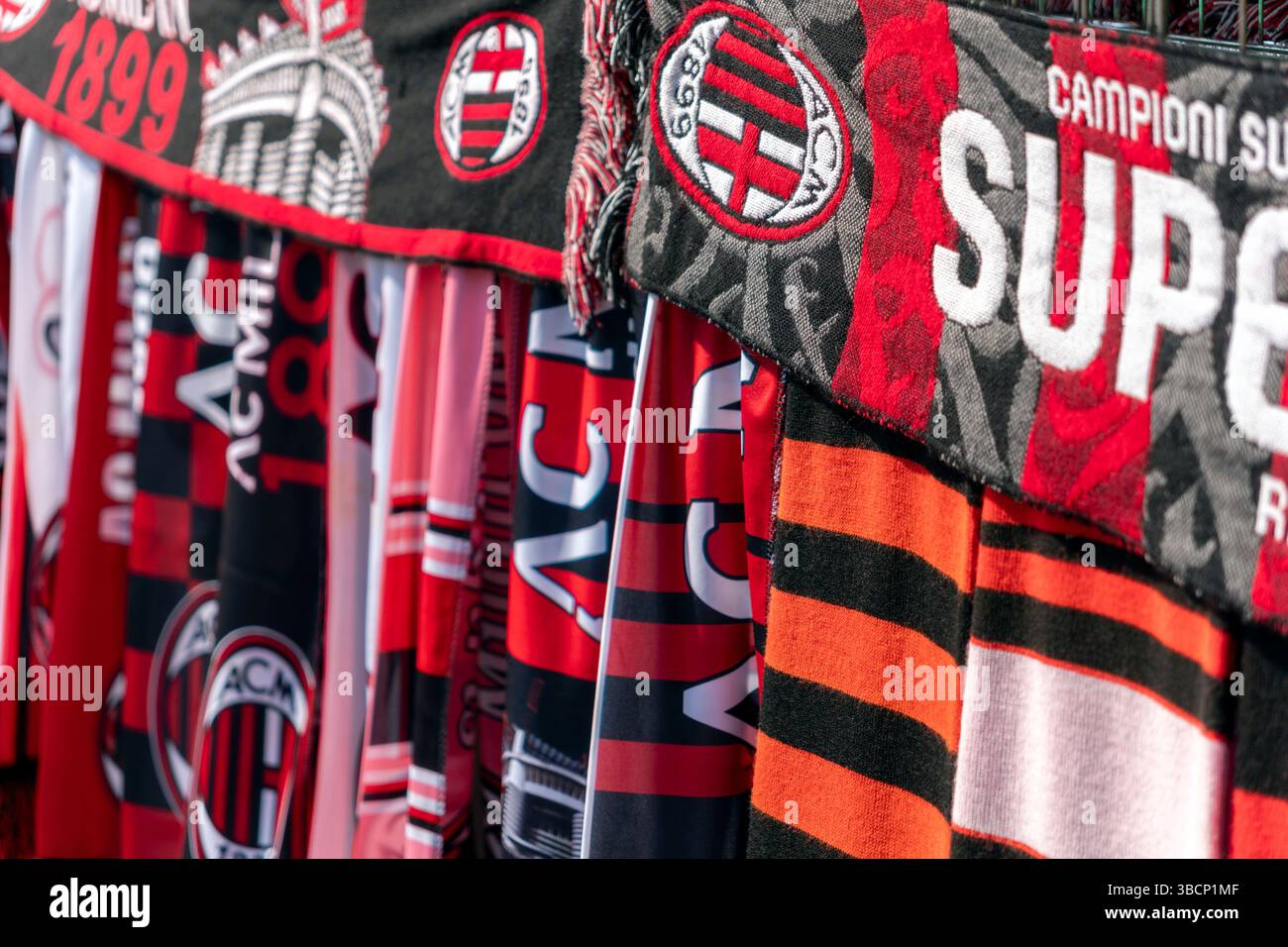 Milan, Italy - April 5, 2025: Colorful AC Milan scarves displayed in a ...