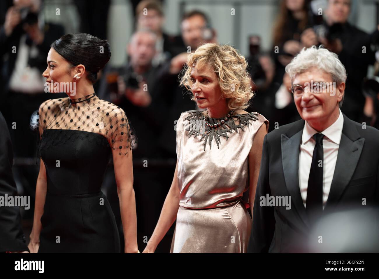 Cannes, France. 20th May, 2025. Mario Martone, Valeria Golino, and ...