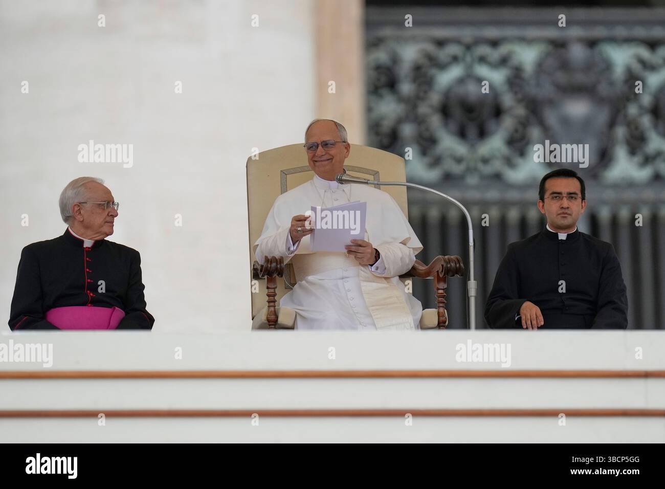 Pope Leo XIV holds his first weekly general audience flanked by Father ...