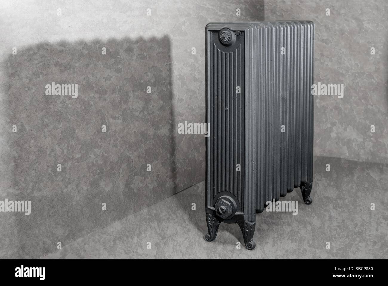Churchill cast iron radiator Stock Photo - Alamy