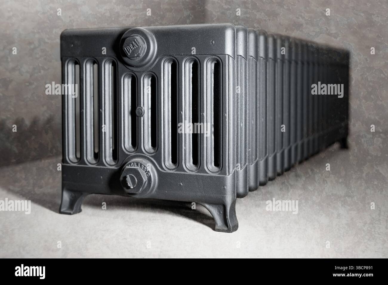 Cast iron radiator casting mark Stock Photo - Alamy