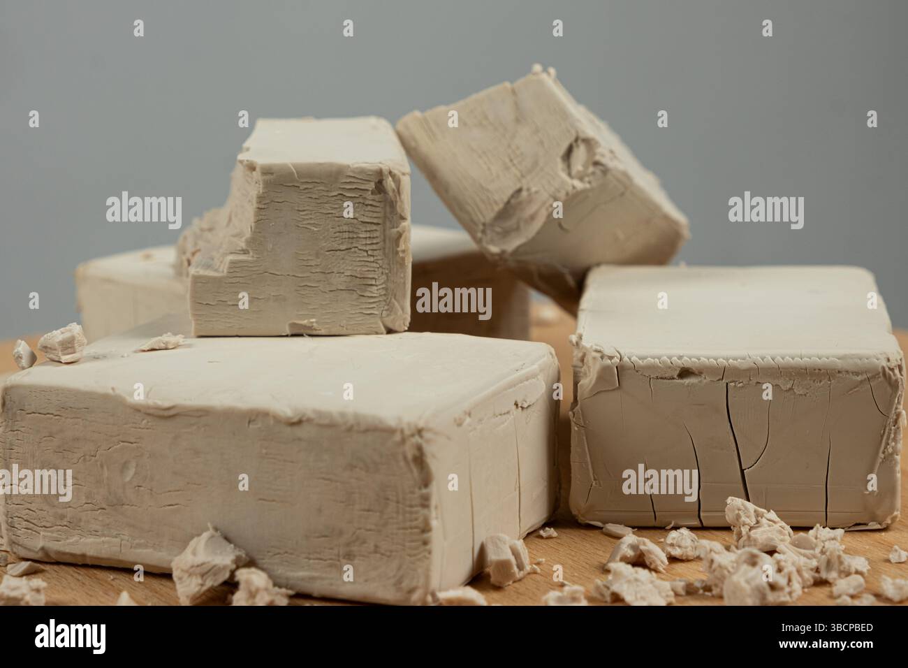 Fresh Compressed Yeast Blocks on Gray Background Stock Photo - Alamy