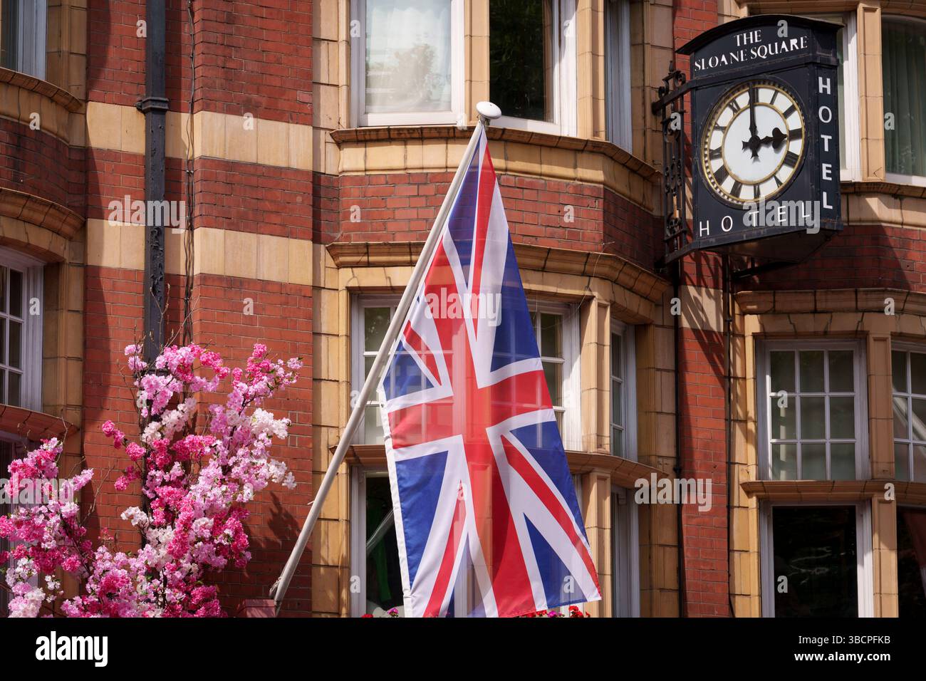 Flowers and a union jack flag at the Sloane Square Hotel during the ...