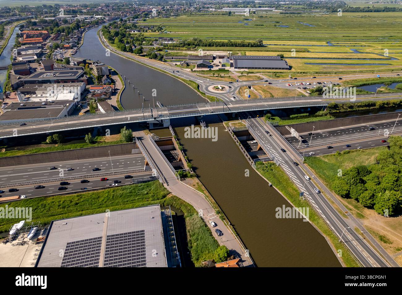 Inland shipping waterway infrastructure over and under freeway ...