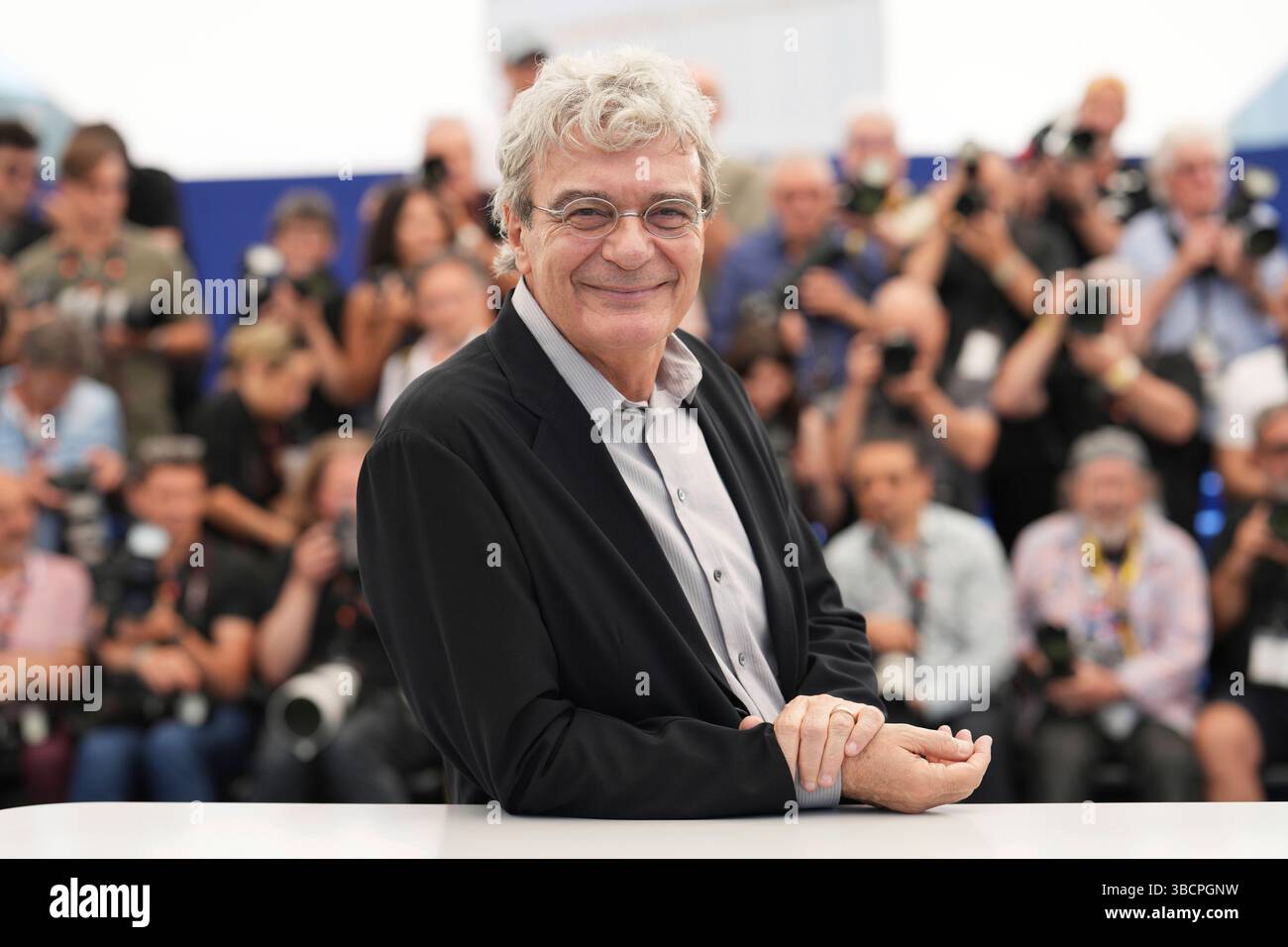 Director Mario Martone poses for photographers at the photo call for ...