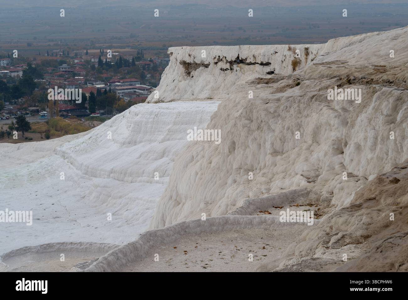 Layers of travertines form terraces of carbonate minerals in Pamukkale ...