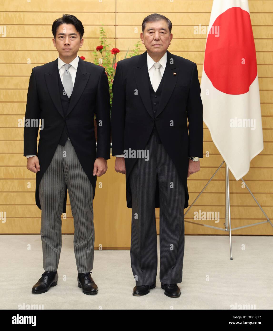 Japanese newly appointed Agriculture Minister Shinjiro Koizumi (L ...