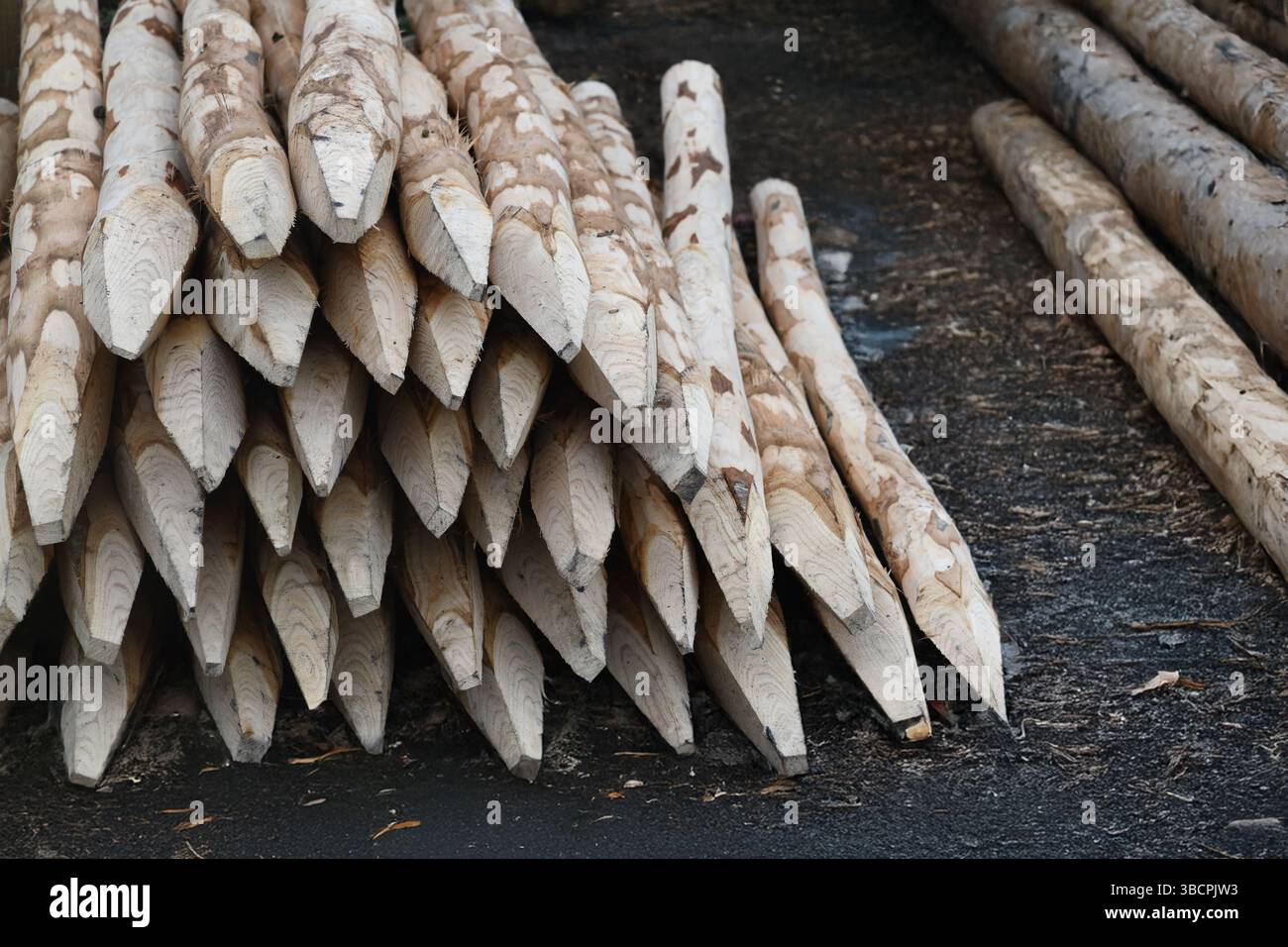 Machine rounded fence posts hi-res stock photography and images - Alamy
