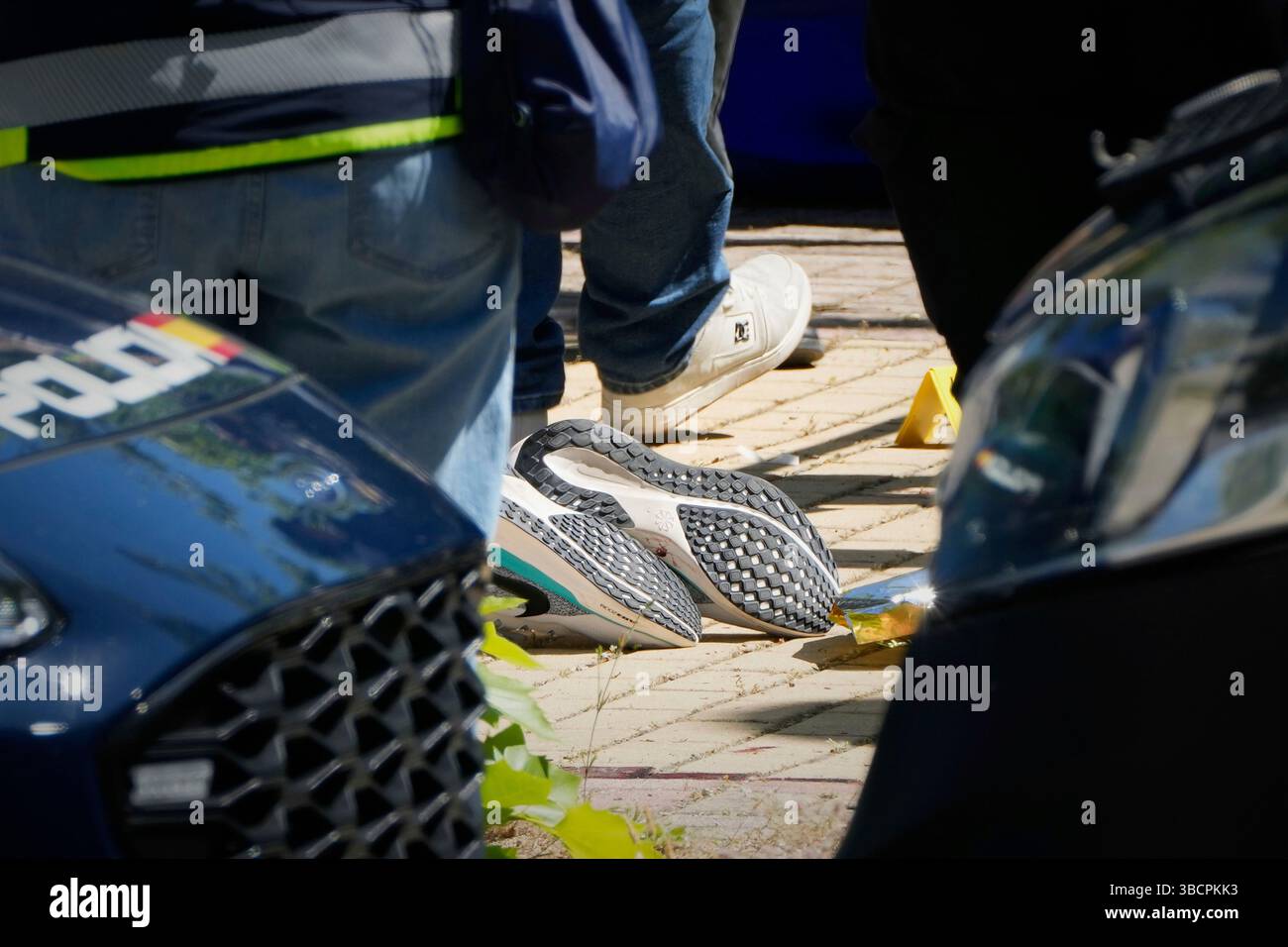 Members of the judicial police work near the body of Andrii Portnov, an ...