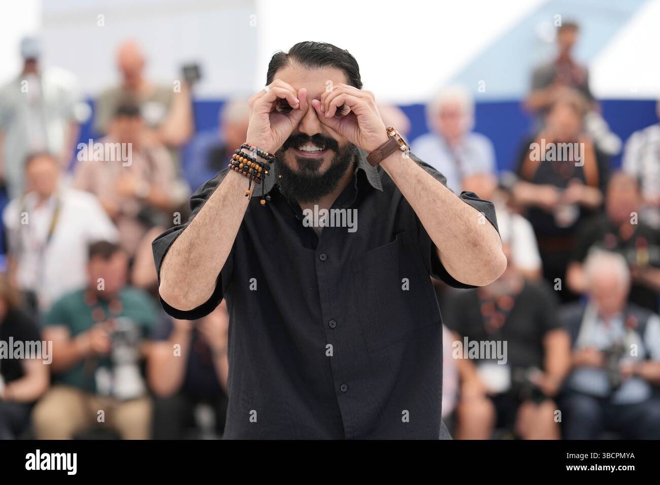 Director Morad Mostafa poses for photographers at the photo call for the film 'Aisha Can't Fly ...