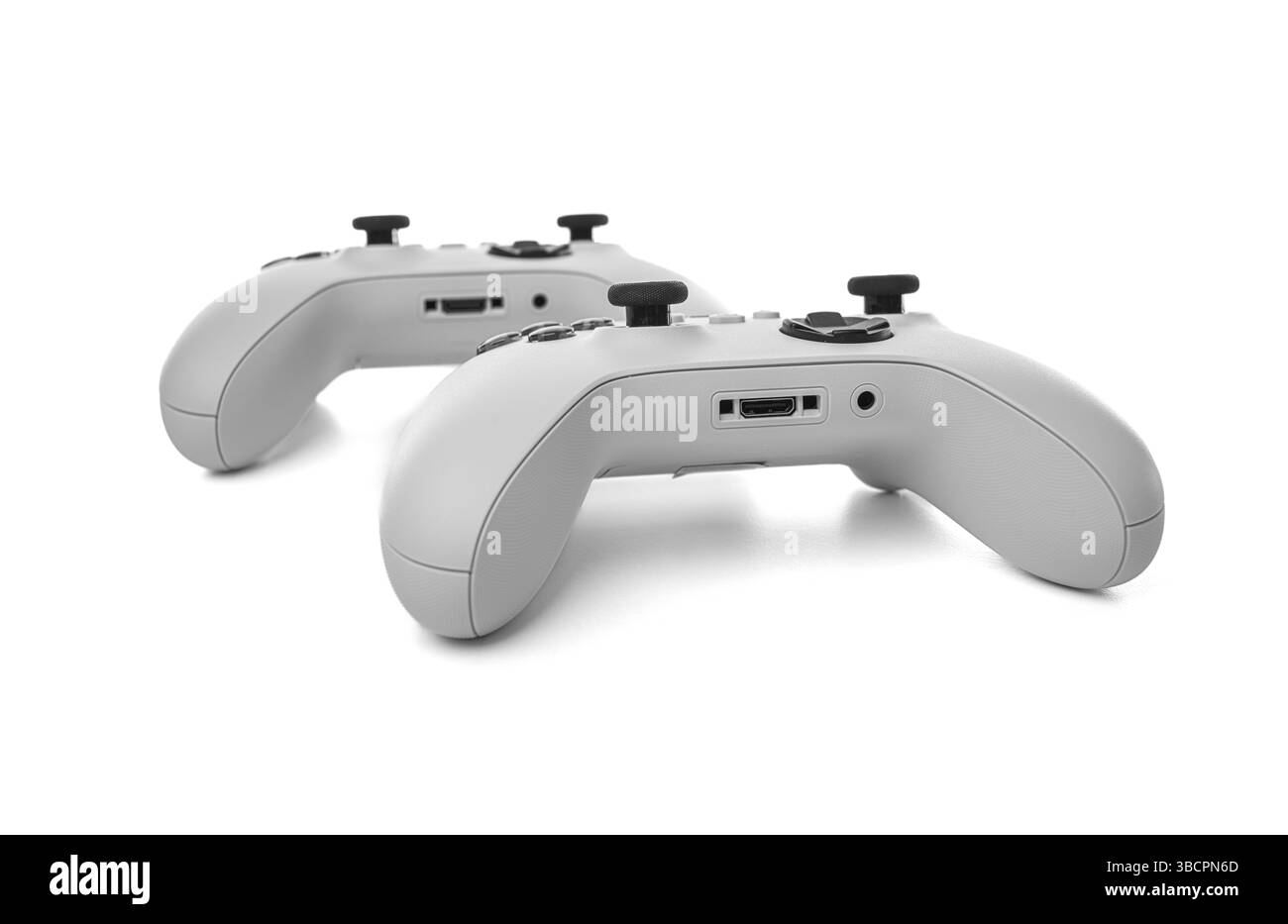 Modern white gaming controller with black buttons and joysticks Stock ...