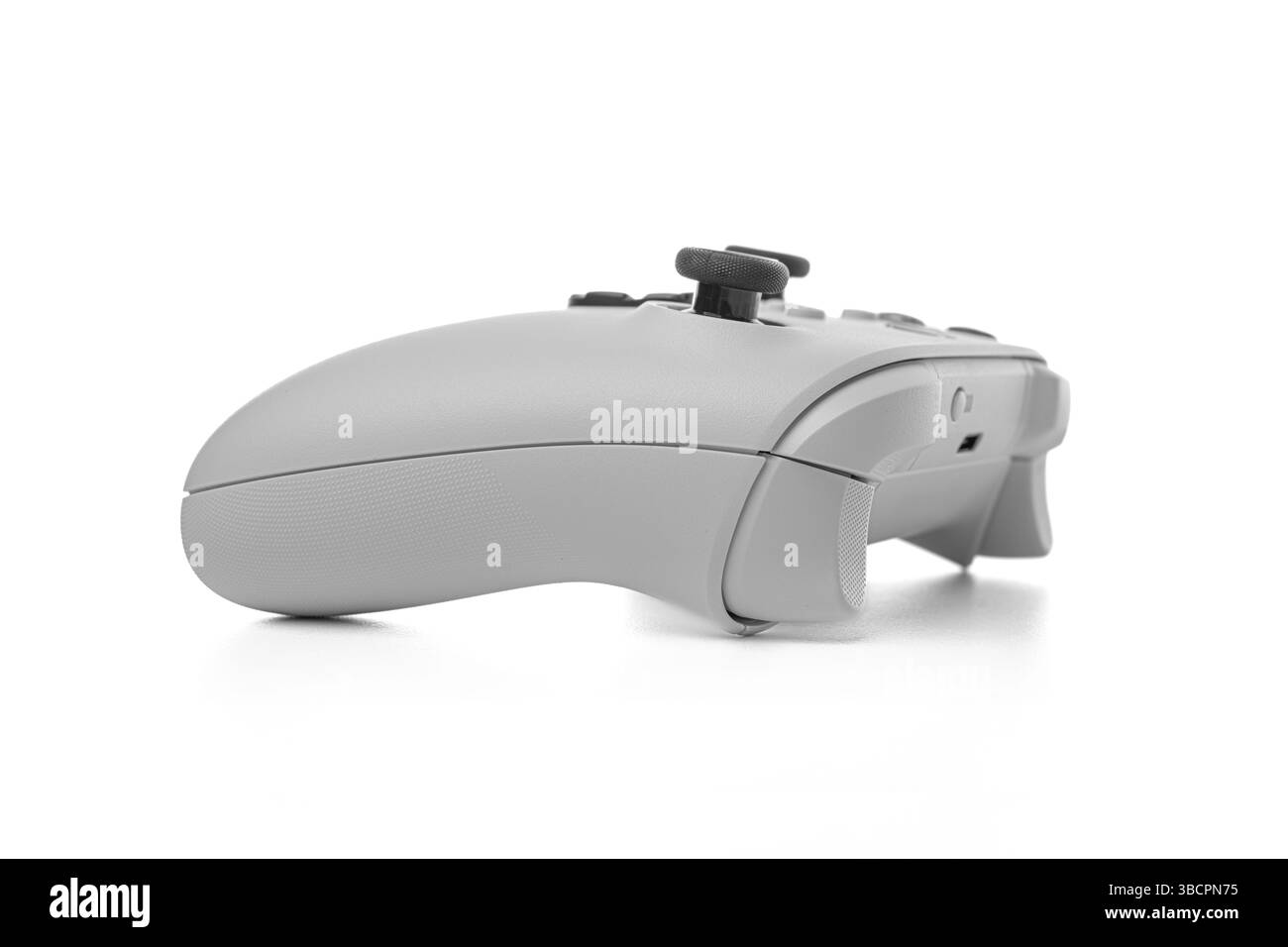 White gaming controller with a symmetrical design Stock Photo - Alamy