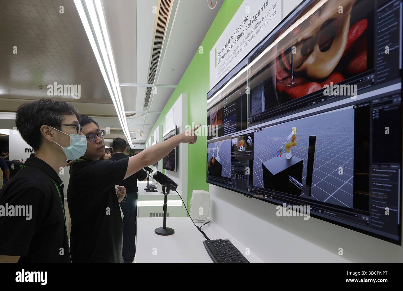 Two members staffs discuss the AI Physical Robotics, build with Nvidia ...