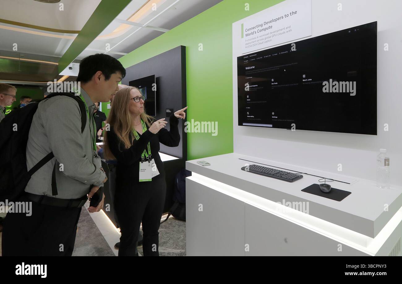 A member staff explains the Nvidia DGX Cloud Lepton during the Computex 2025 exhibition in ...
