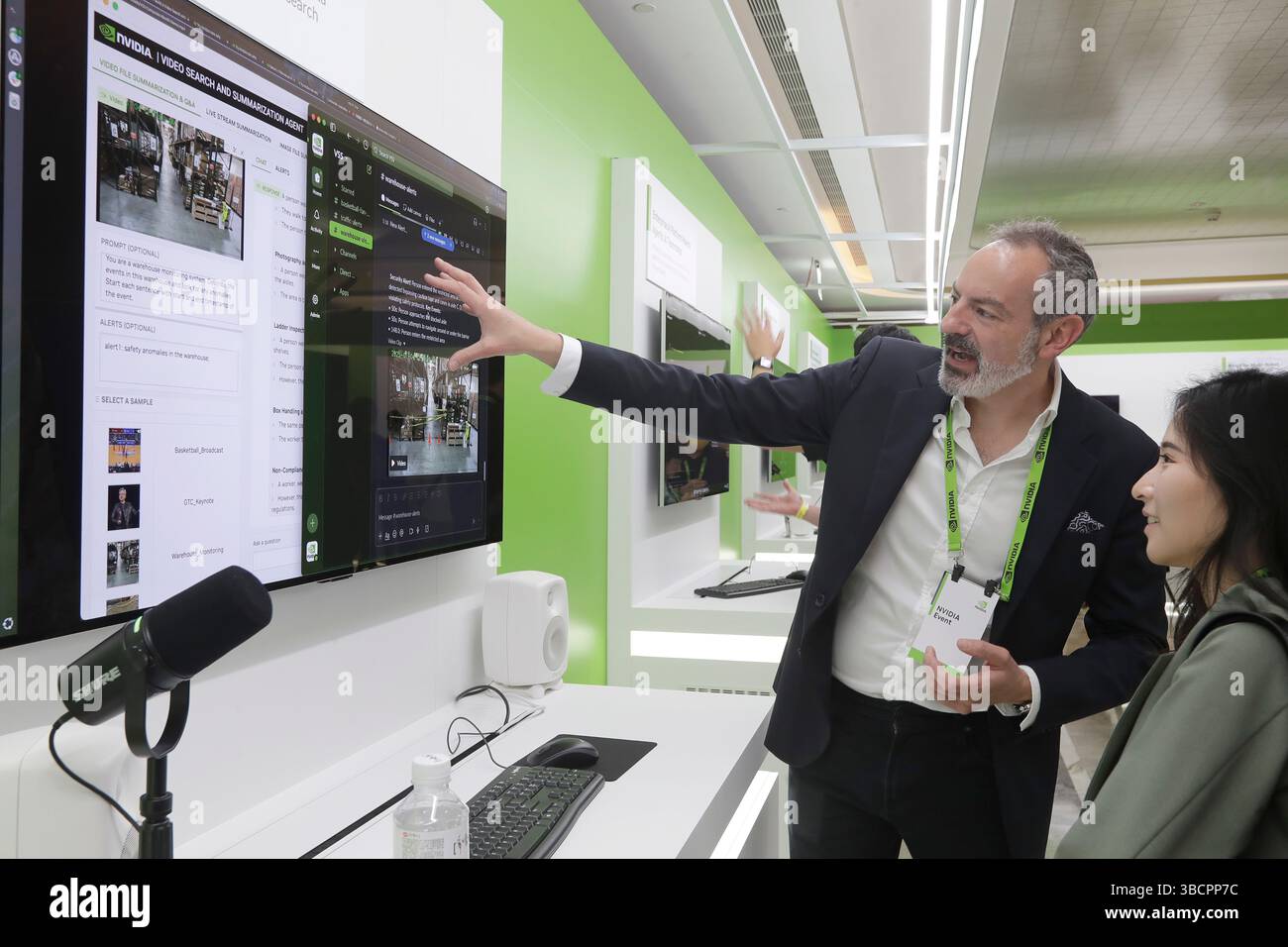 A Nvidia staff explains visual data AI agent during the Computex 2025 ...