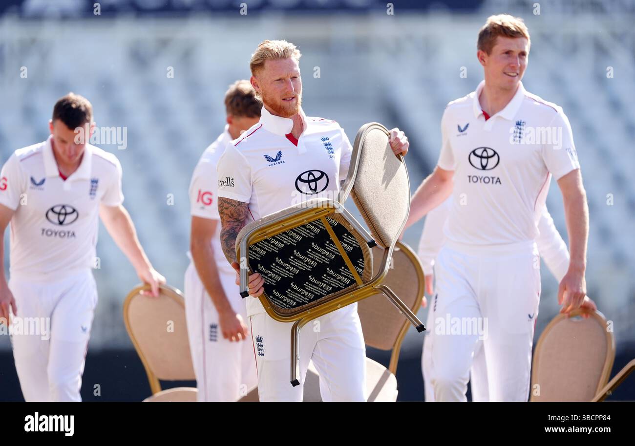 England's Ben Stokes carries a chair ahead of a nets session at Trent ...