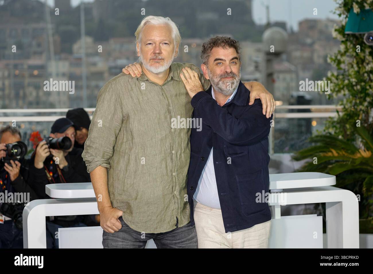 Julian Assange and Eugene Jarecki pose at the photocall of 'The Six ...