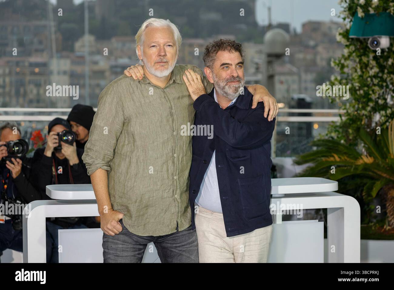 Julian Assange and Eugene Jarecki pose at the photocall of 'The Six ...