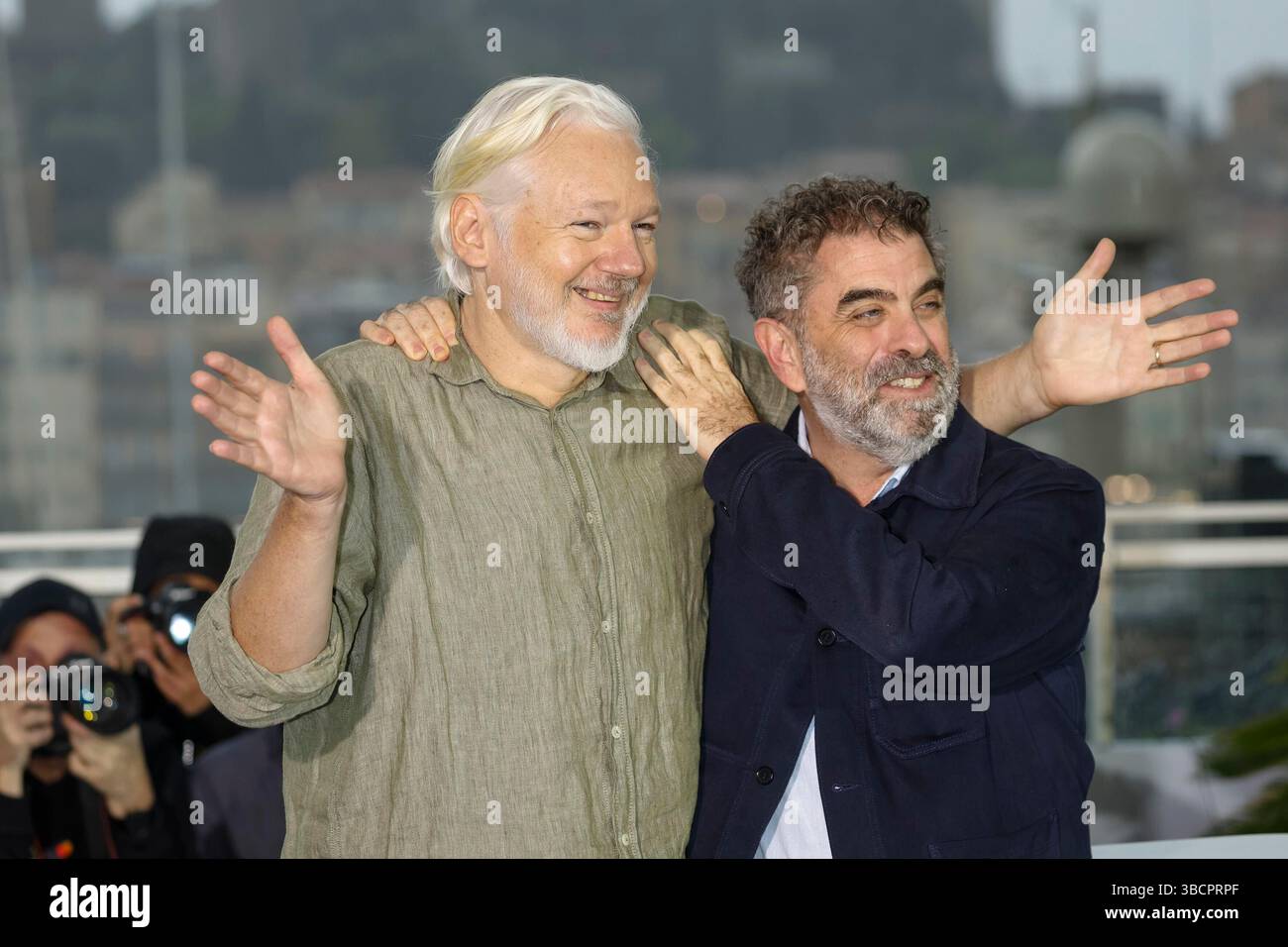 Julian Assange and Eugene Jarecki pose at the photocall of 'The Six ...