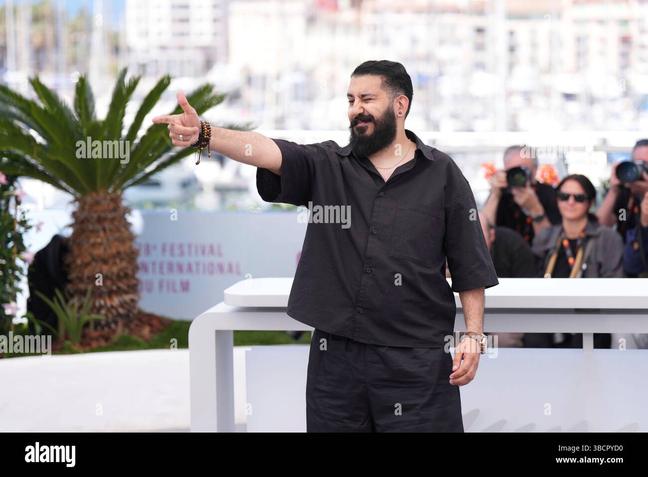Director Morad Mostafa poses for photographers at the photo call for the film 'Aisha Can't Fly ...