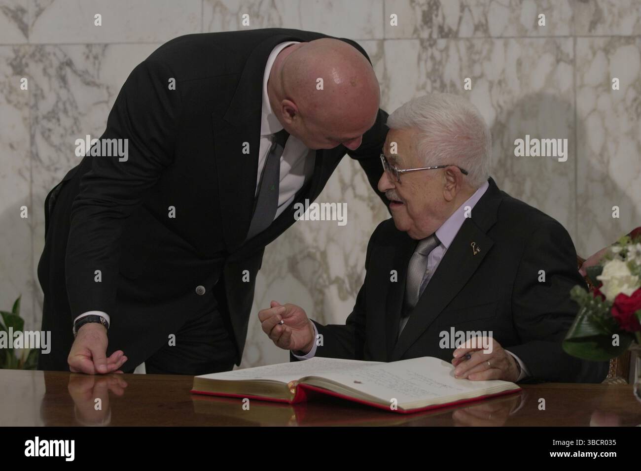 Palestinian President Mahmoud Abbas, right, speaks with Lebanese ...