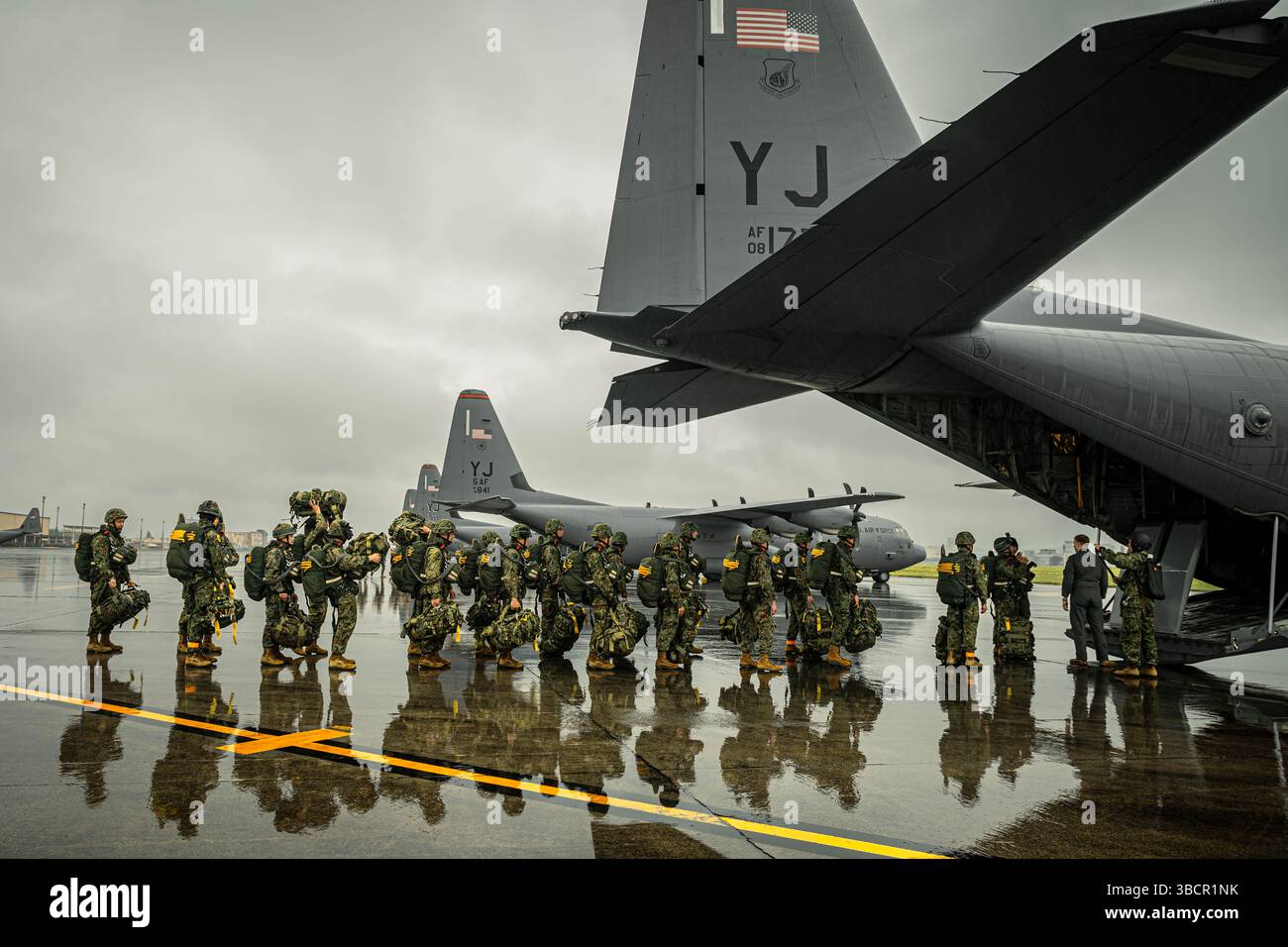 Japan Ground Self-Defense Force paratroopers assigned to the 1st Airborne Brigade prepare to ...