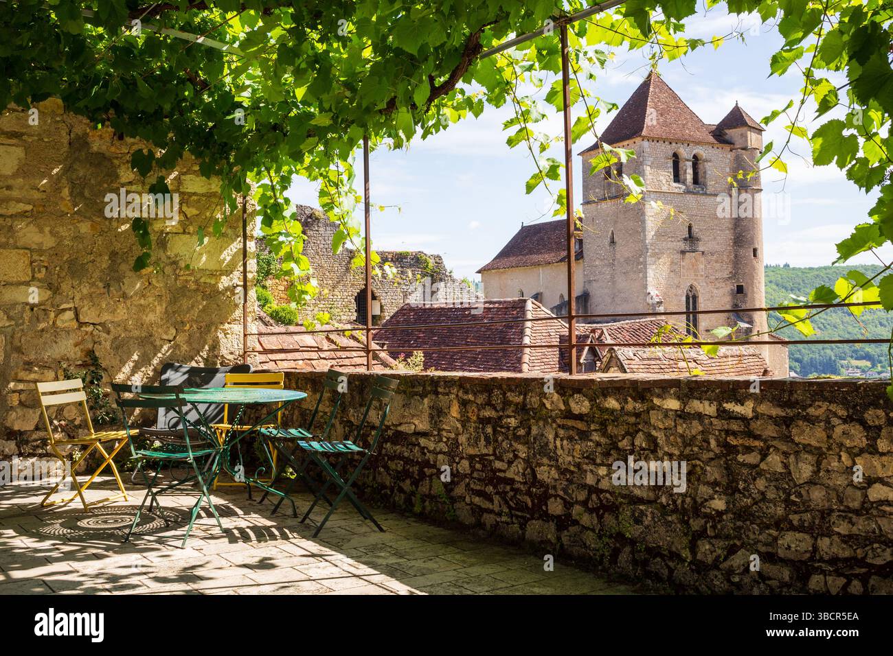 View from a terrace in the old cliffside village of Saint-Cirq-Lapopie in the Occitanie region ...
