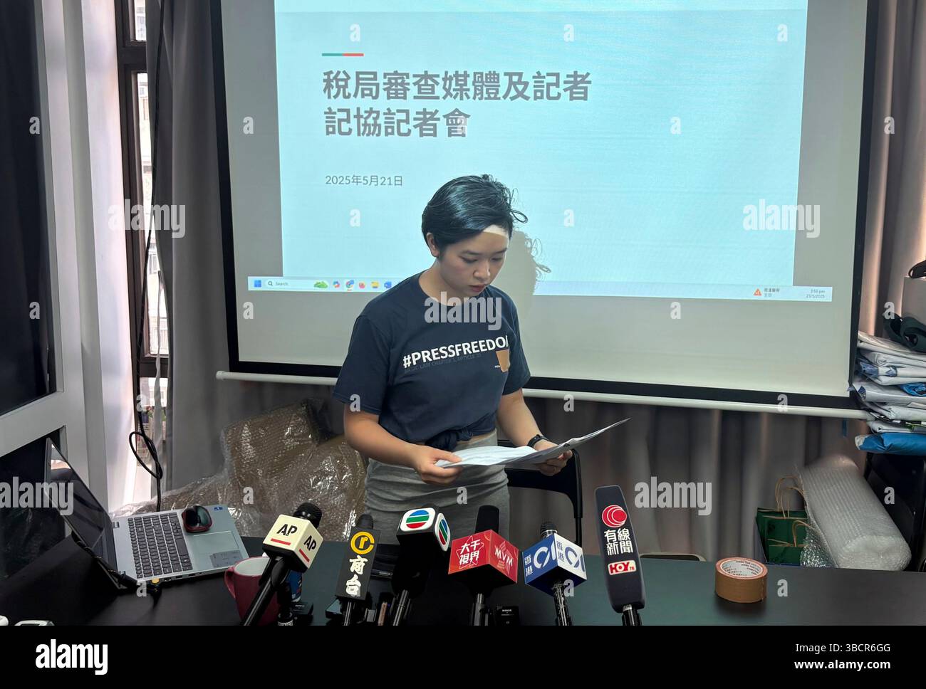 Hong Kong Journalists Association chairperson Selina Cheng holds a ...