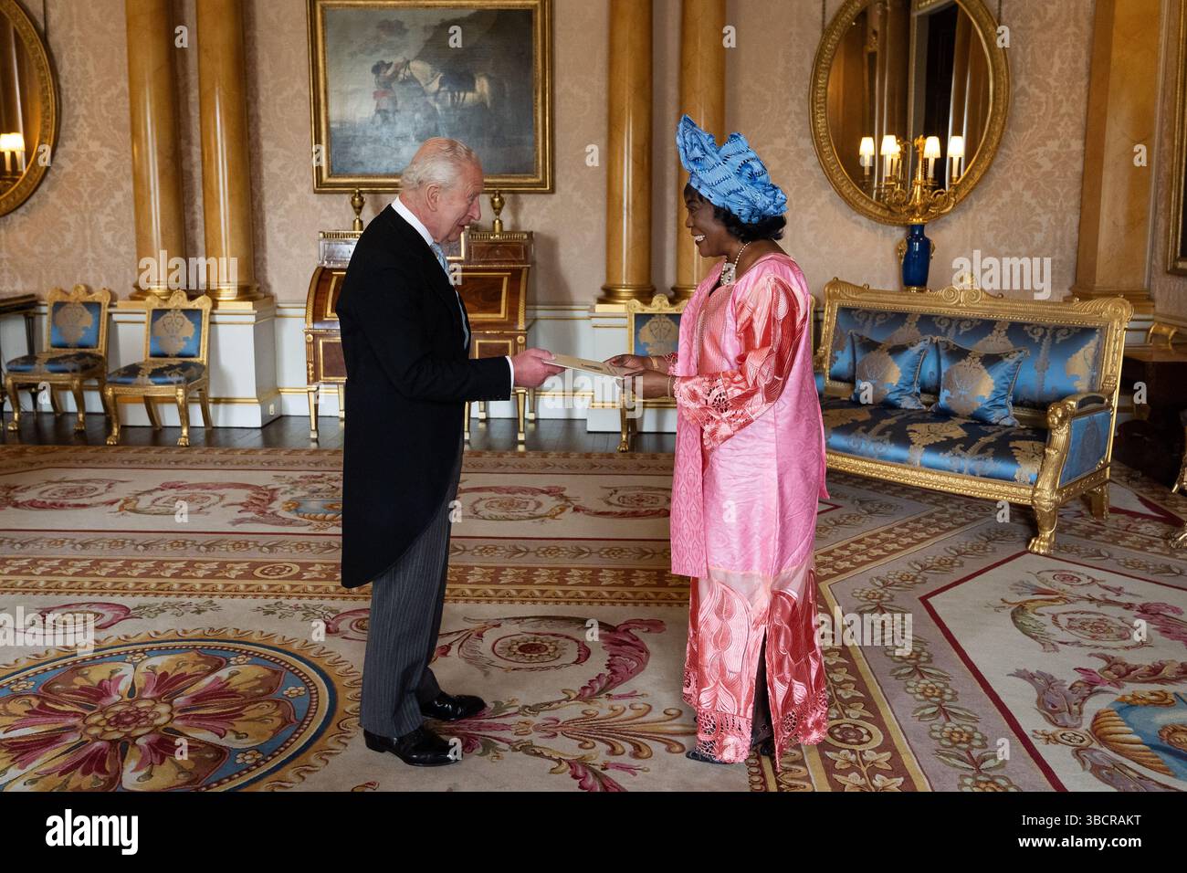 Ambassador of Liberia, Genevieve Kennedy, presents her credentials to King Charles III during a ...