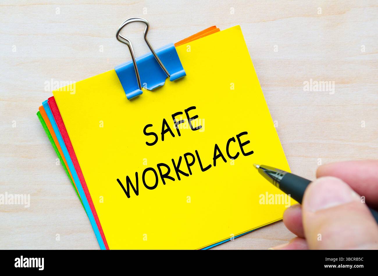 Safe workplace text on yellow sticky notes representing commitment to ...