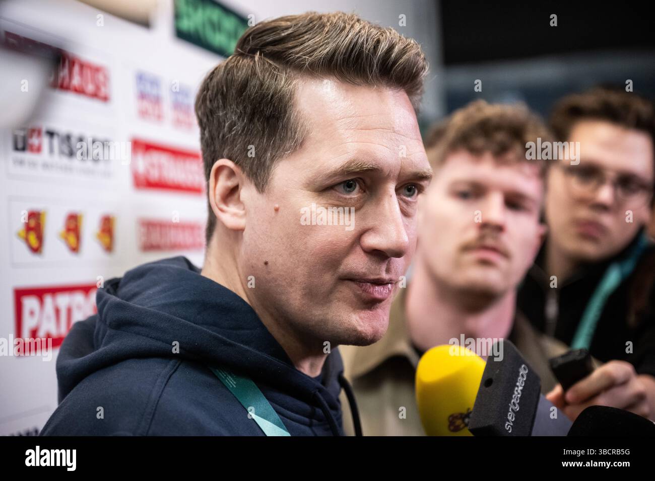 coach Sam Hallam of, Sweden. , . in the mixed zone ahead of a practice ...