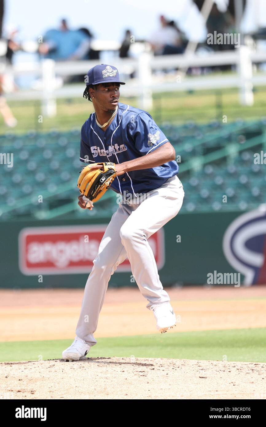 Jefferson Jean (17) of the Stockton Ports pitches against the Inland ...