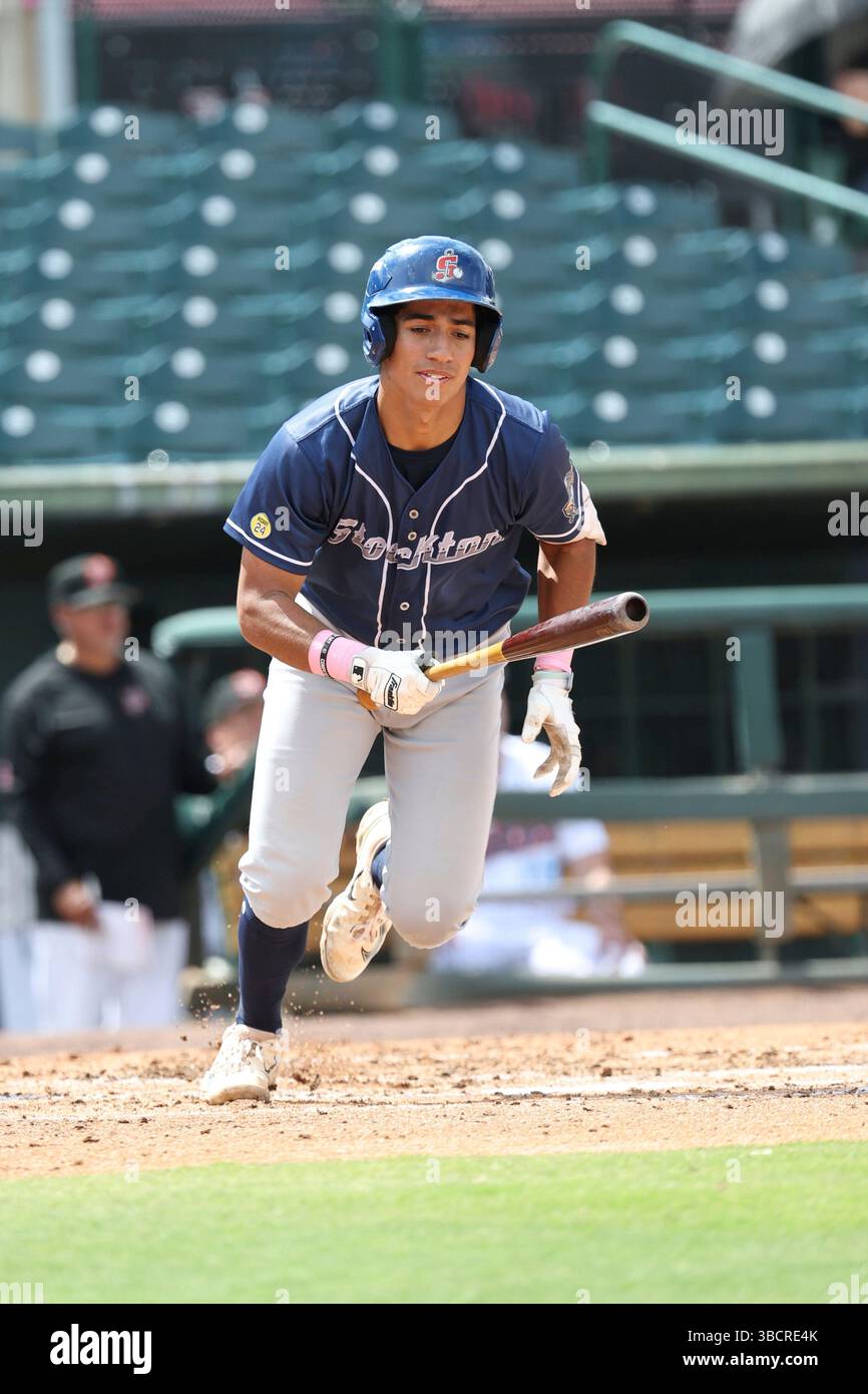 Davis Diaz (5) of the Stockton Ports bats against the Inland Empire ...