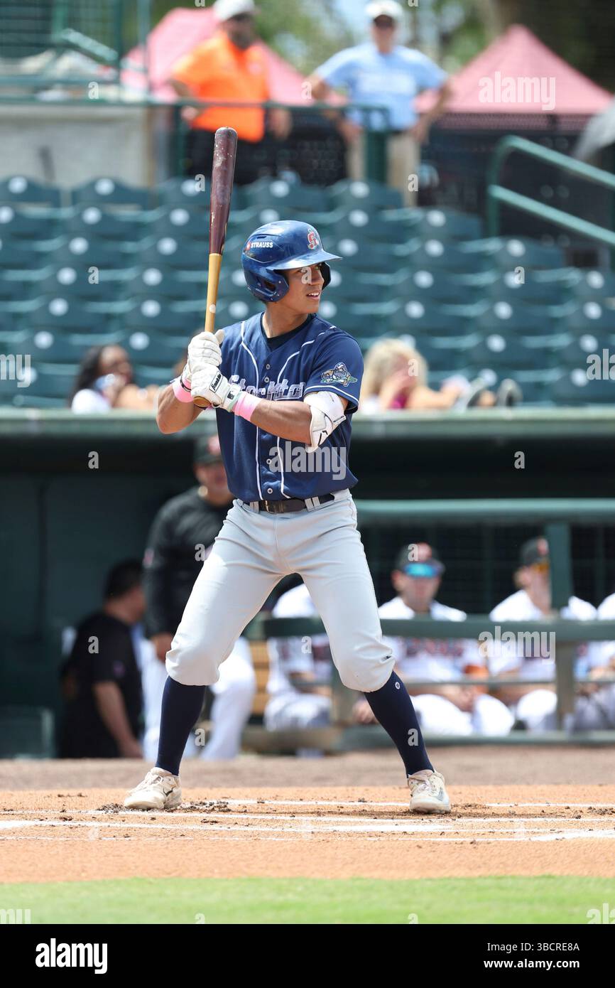 Davis Diaz (5) of the Stockton Ports bats against the Inland Empire ...