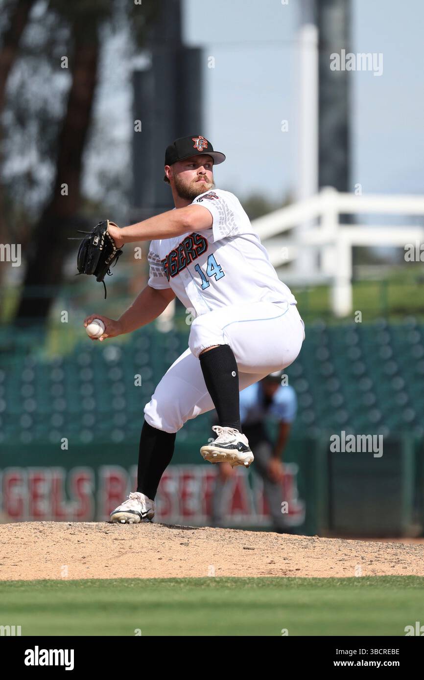 Benny Thompson (14) of the Inland Empire 66ers pitches against the ...