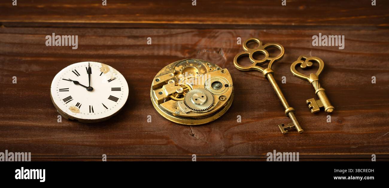 Gold keys with clock and clockwork. Escape room game solution concept ...
